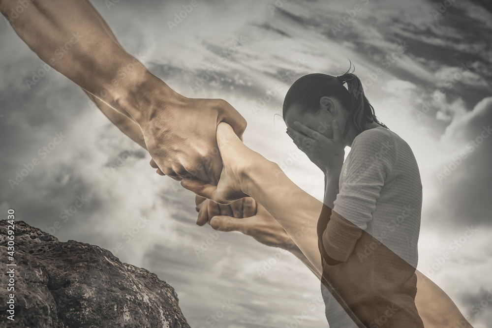 Sad distressed woman getting a helping hand Stock Photo | Adobe Stock