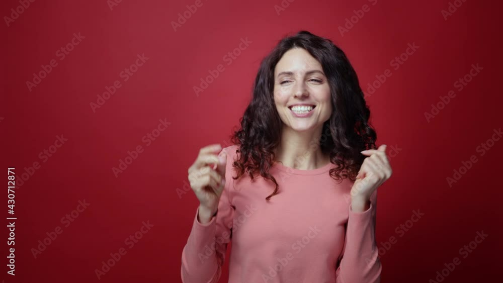 Extremely happy millennial woman cheering with winner dance, excited of ...
