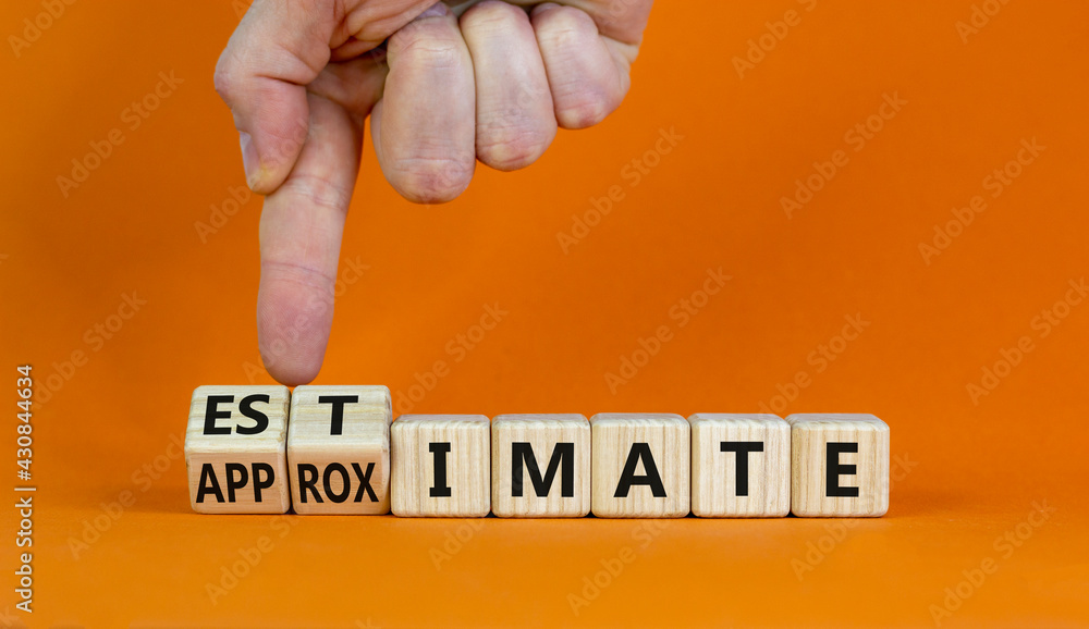 Estimate or approximate symbol. Businessman turns wooden cubes and ...