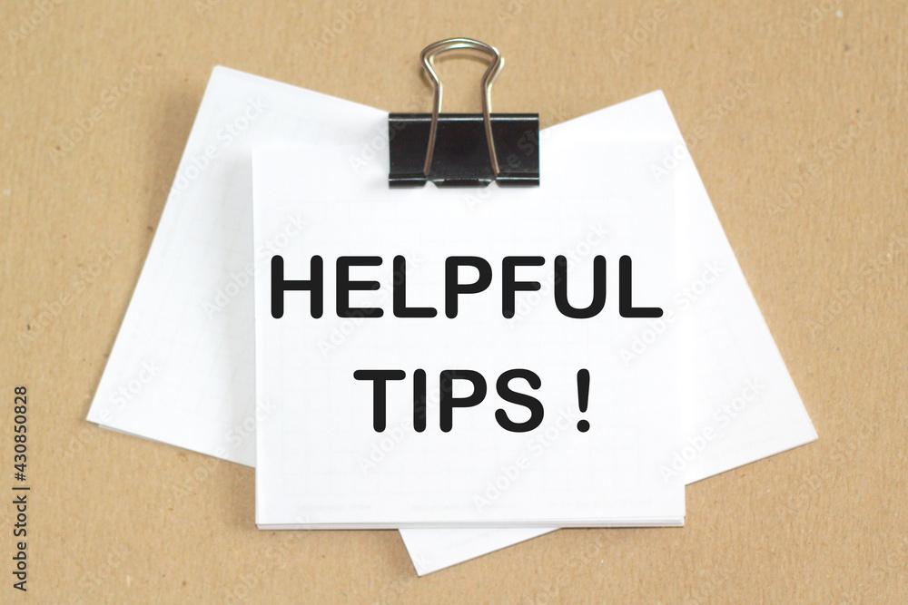 HELPFUL TIPS . A small piece of paper clamped by binder clip to a wire ...