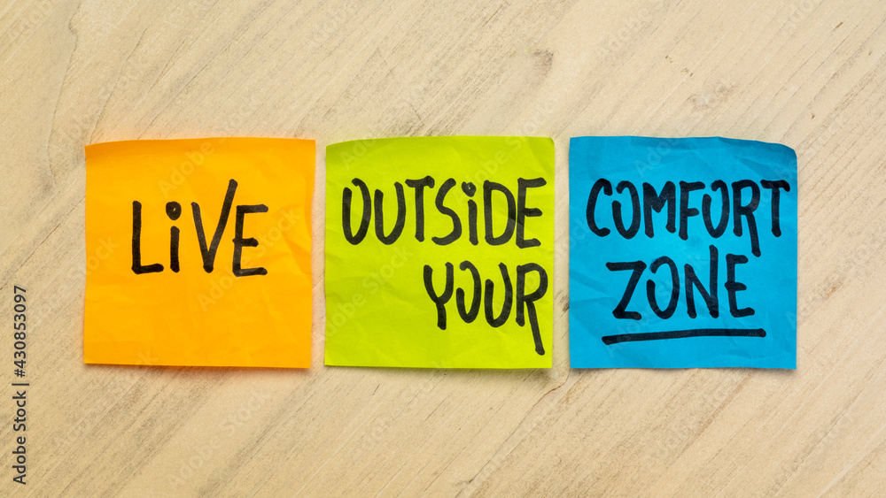 Live outside your comfort zone - motivational handwriting in black ink ...