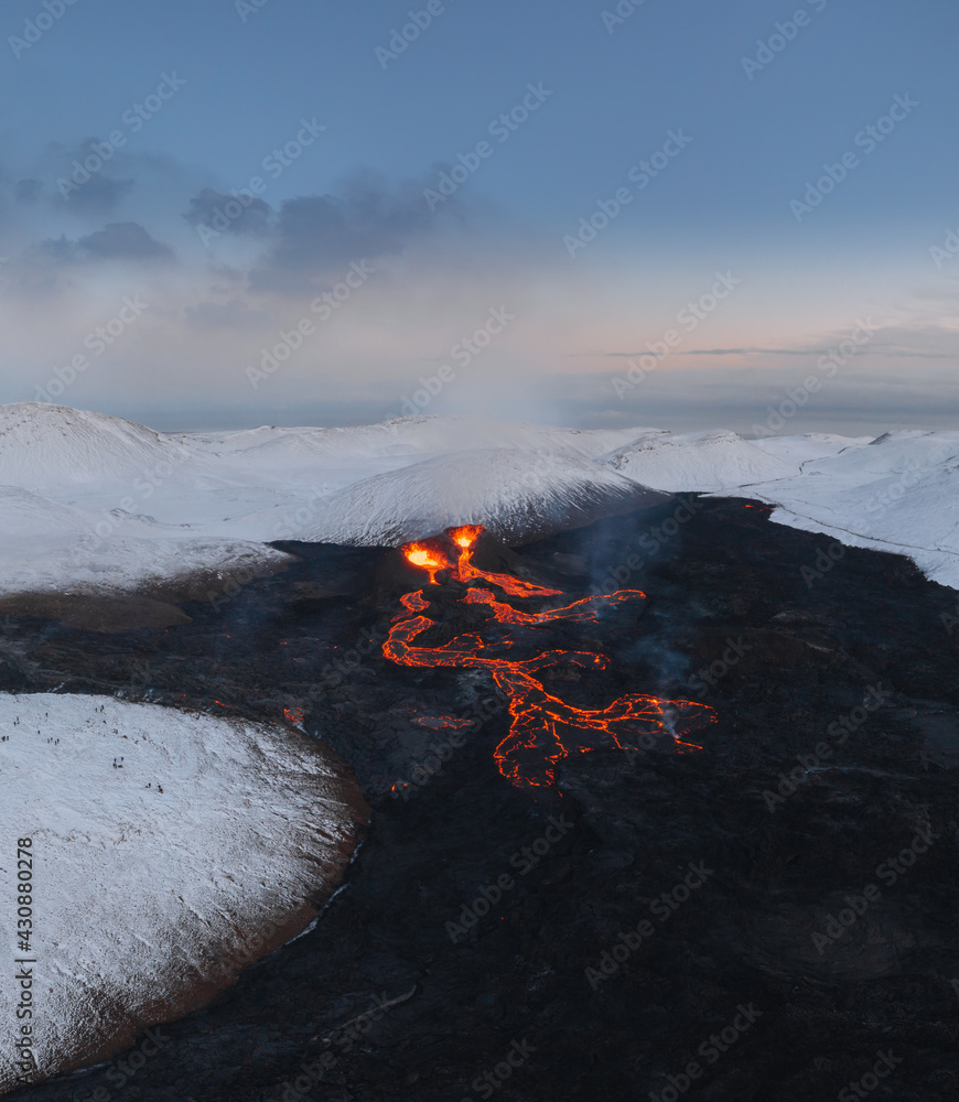 Aerial Panorama of active lava river flows from a volcanic eruption in ...