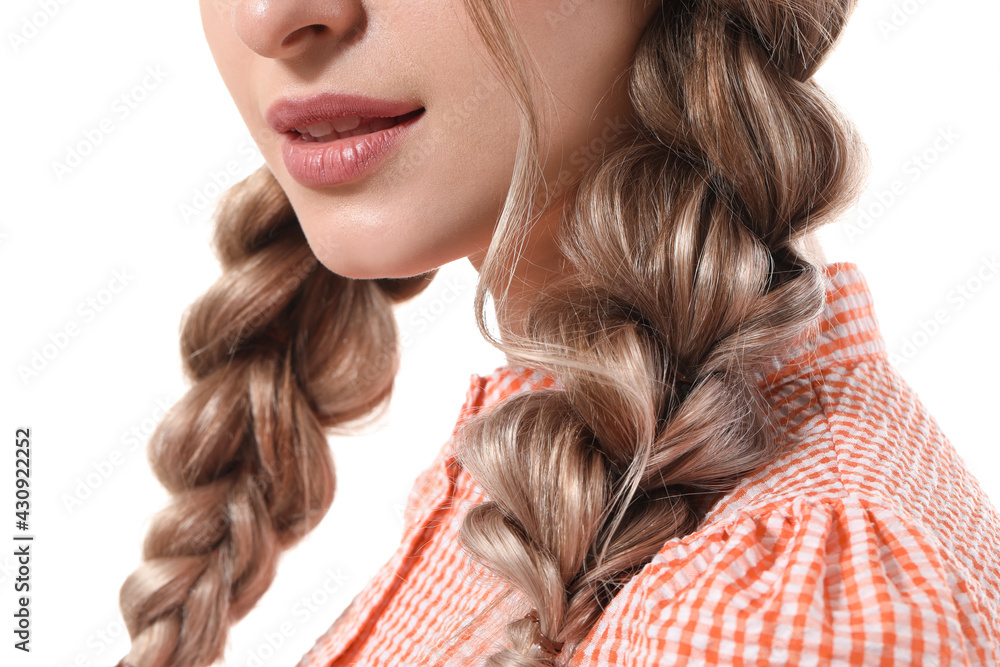 Beautiful young woman with braided hair on white background, closeup ...