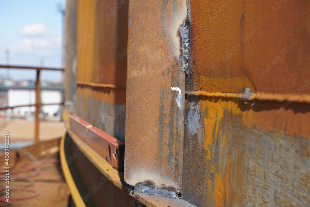 Manual arc welding. Defective butt weld of welding of metal sheets ...