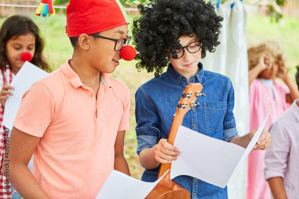 Children in funny disguise discuss performance Stock Photo | Adobe Stock