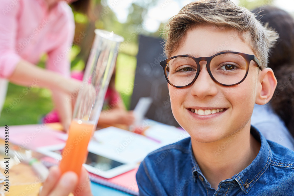 Boy Holds A Test Tube During An Experiment Stock Photo Adobe Stock boy-holds-a-test-tube-during-an-experiment-stock-photo-adobe-stock