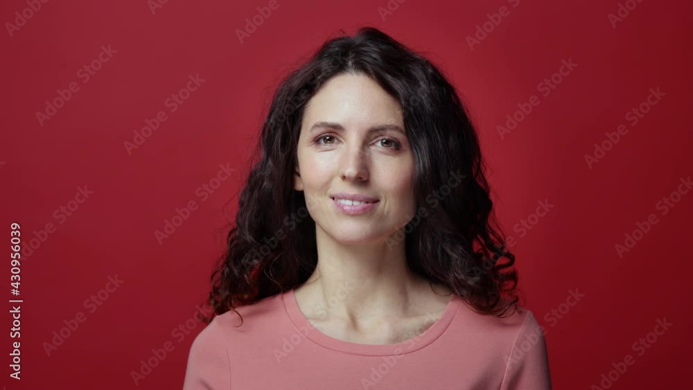 Closeup portrait of happy smiling millennial female isolated over red ...