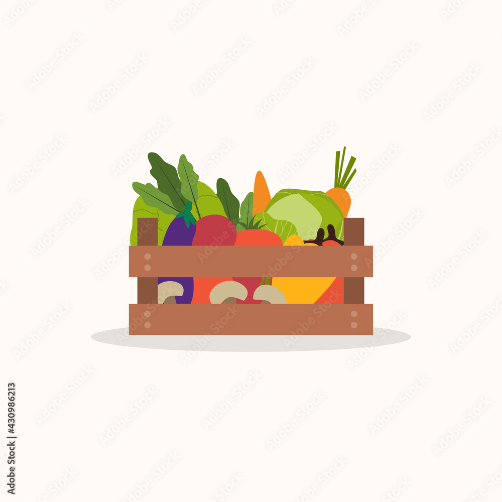 Wooden box with fresh vegetables. Eggplant, cabbage, broccoli, tomato ...