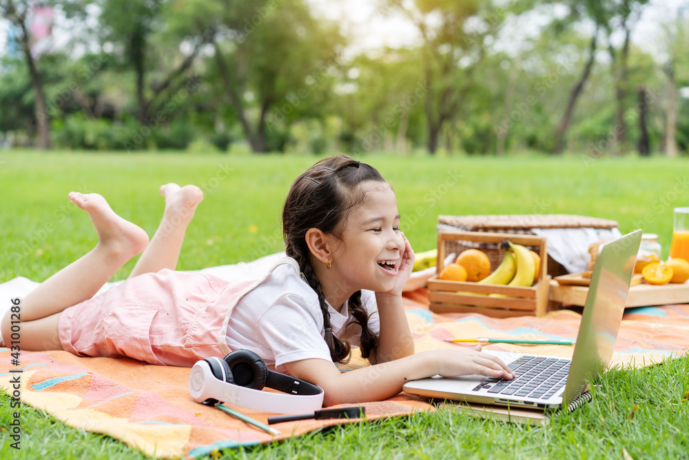 Happy little girl child smiling, talking, learning and having fun ...