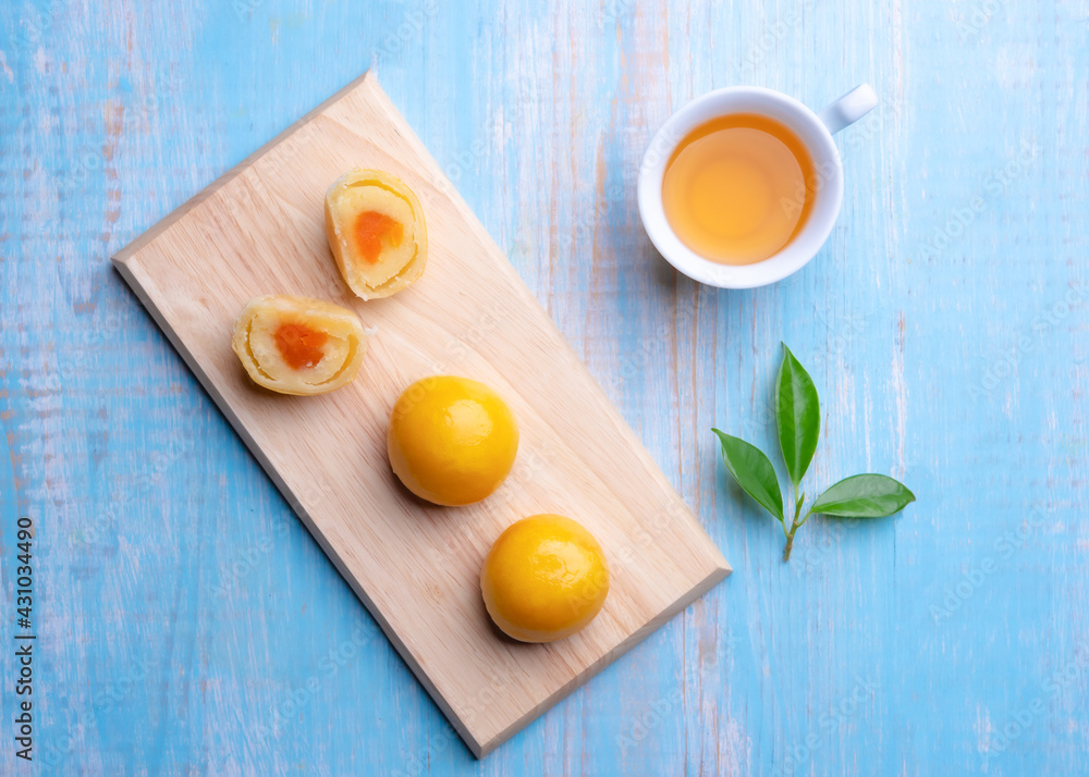 Chinese pastry puff, Beans cake with salted egg yolk lay on table wood ...