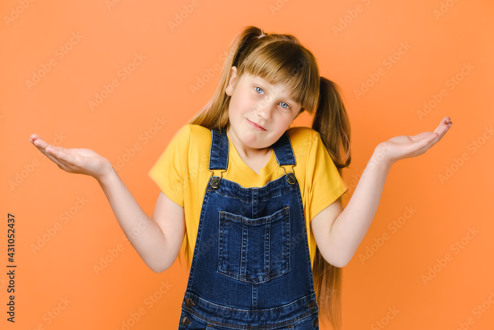 Confused caucasian girl child shrug as sign of doubt making choice ...