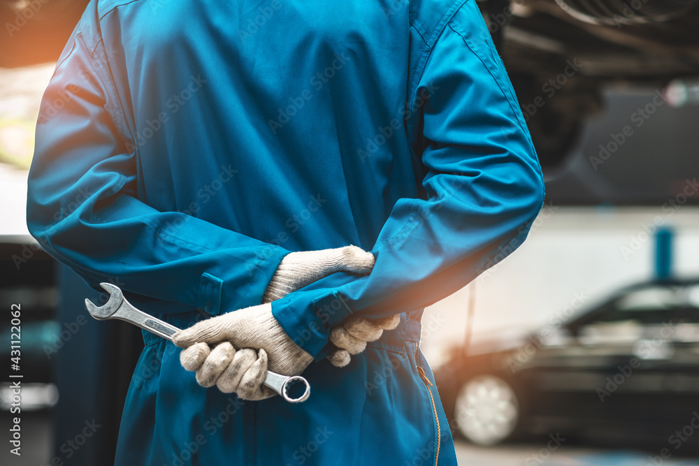 Car Mechanic Ready For Work. Auto Mechanic with Large Wrench in Hands ...