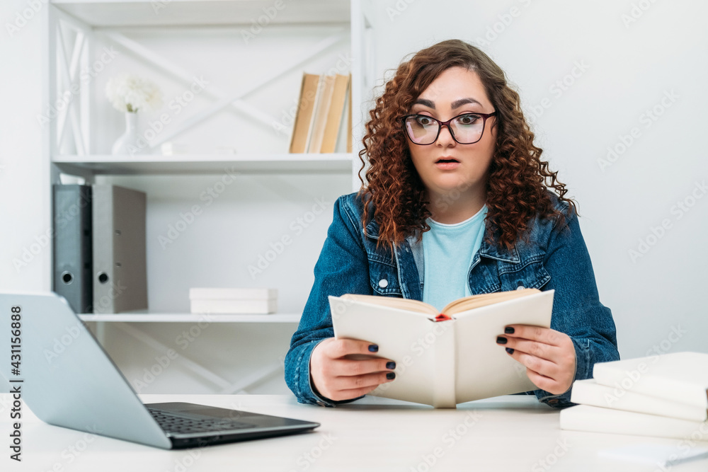 Online education. Shocked woman. Heard lesson. Homework task. Surprised ...