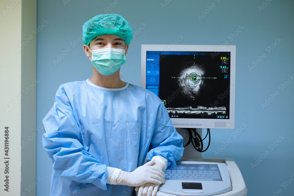 Doctor wears sterile uniform and uses Intravascular ultrasound imaging ...