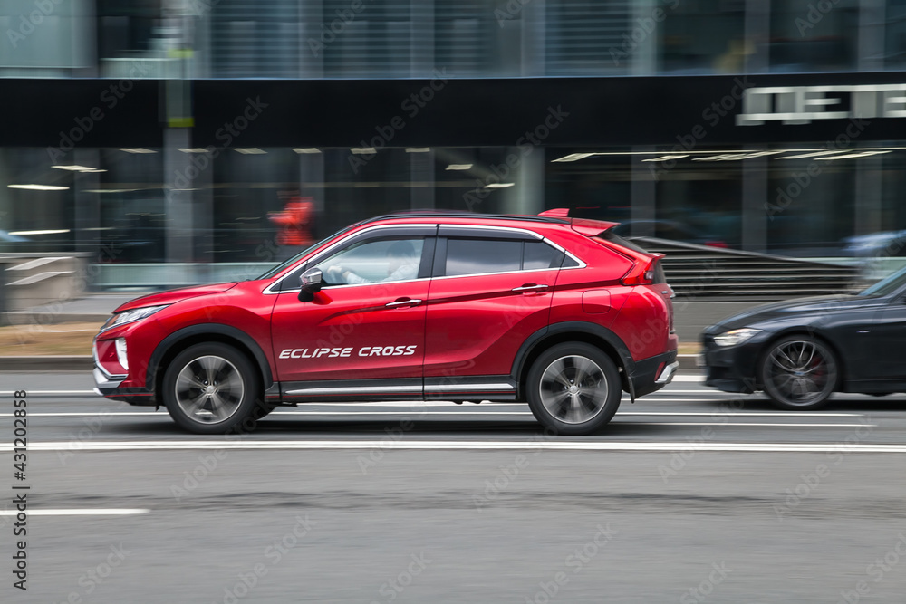 Mitsubishi Eclipse Cross is a compact SUV. Red crossover in red colour ...