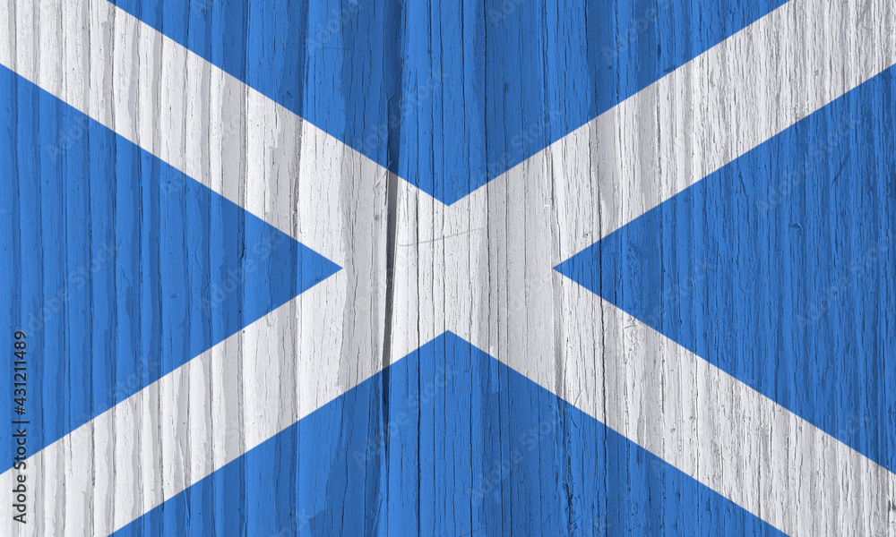 Scottish flag on a dry wooden surface. Natural background, wallpaper or ...