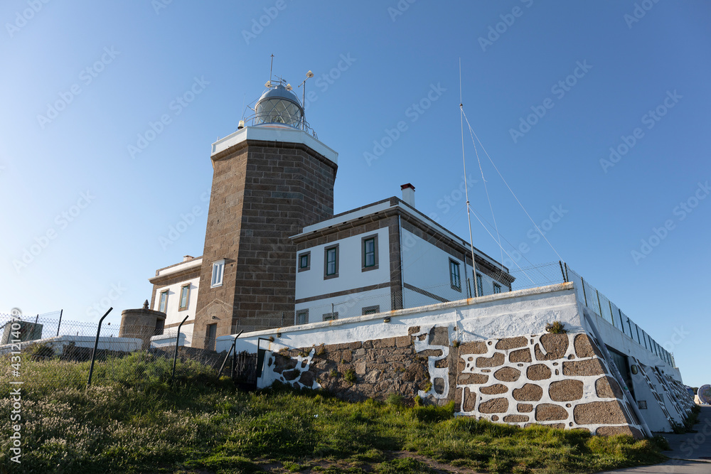 Finisterre lighthouse in the far west of Europe. It is considered by ...