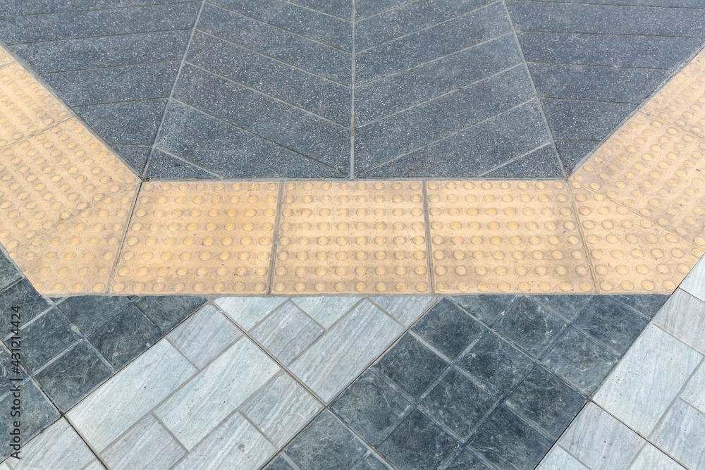 Concrete ramp way with stainless steel handrail with disabled sign for ...