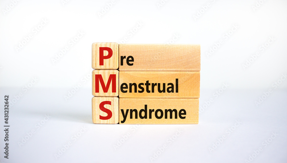 Medical and PMS, premenstrual syndrome symbol. Wooden cubes and blocks ...