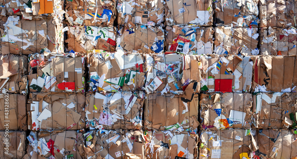 stack of old waste paper in front of recycling facility Stock Photo ...