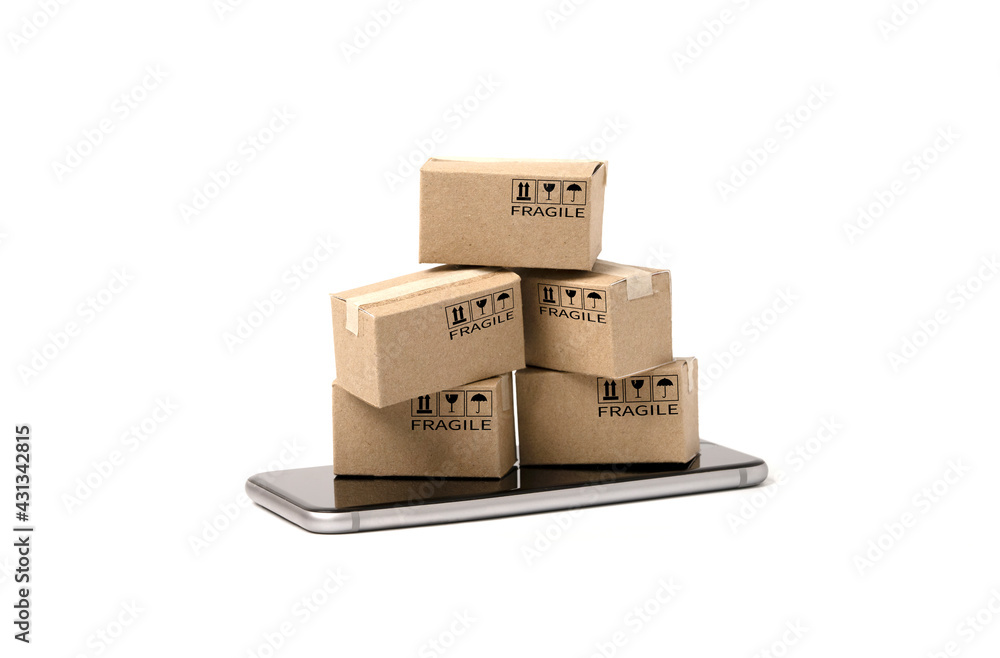 Isolated of Small Cartons box on smartphone for online shopping and e ...
