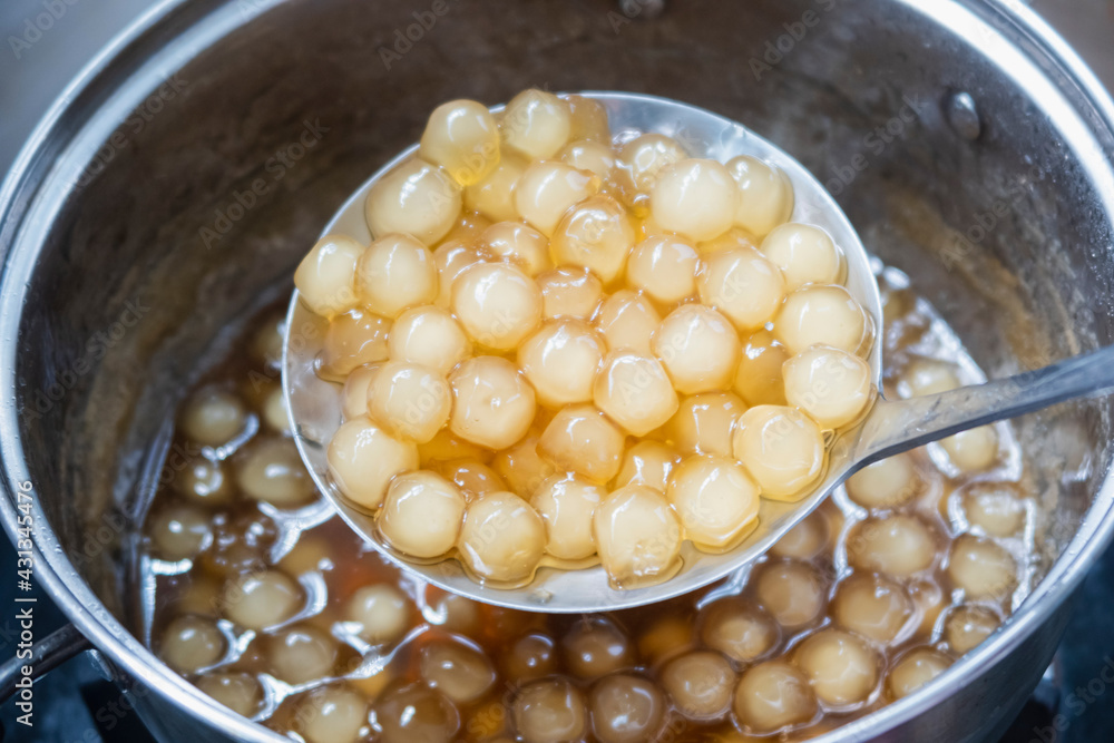 thai dessert call Palm ball Syrup on big spoon make from corypha ...