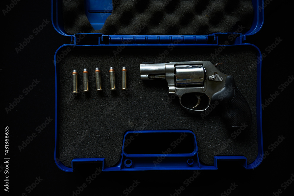The compact revolver gun, Revolver Pistol in box set Stock Photo ...