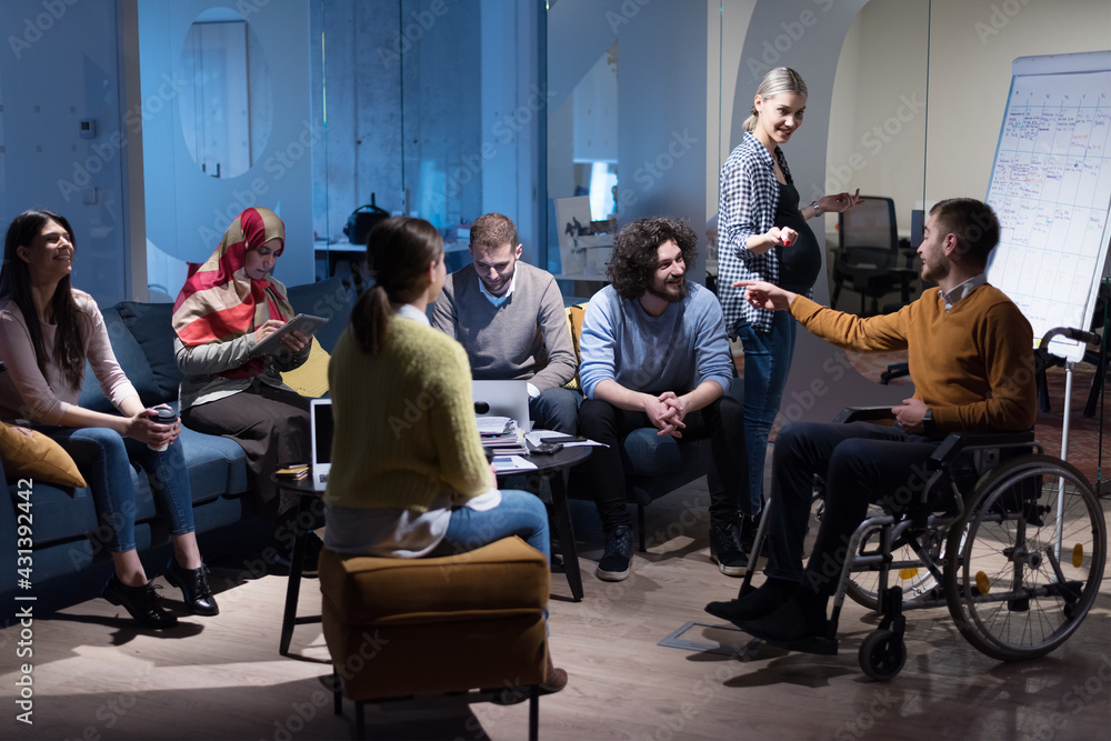 Disabiliti concept. Diverse group of architects with one in wheelchair ...