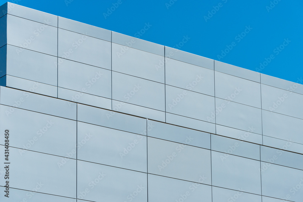 The exterior wall of a contemporary commercial style building with ...