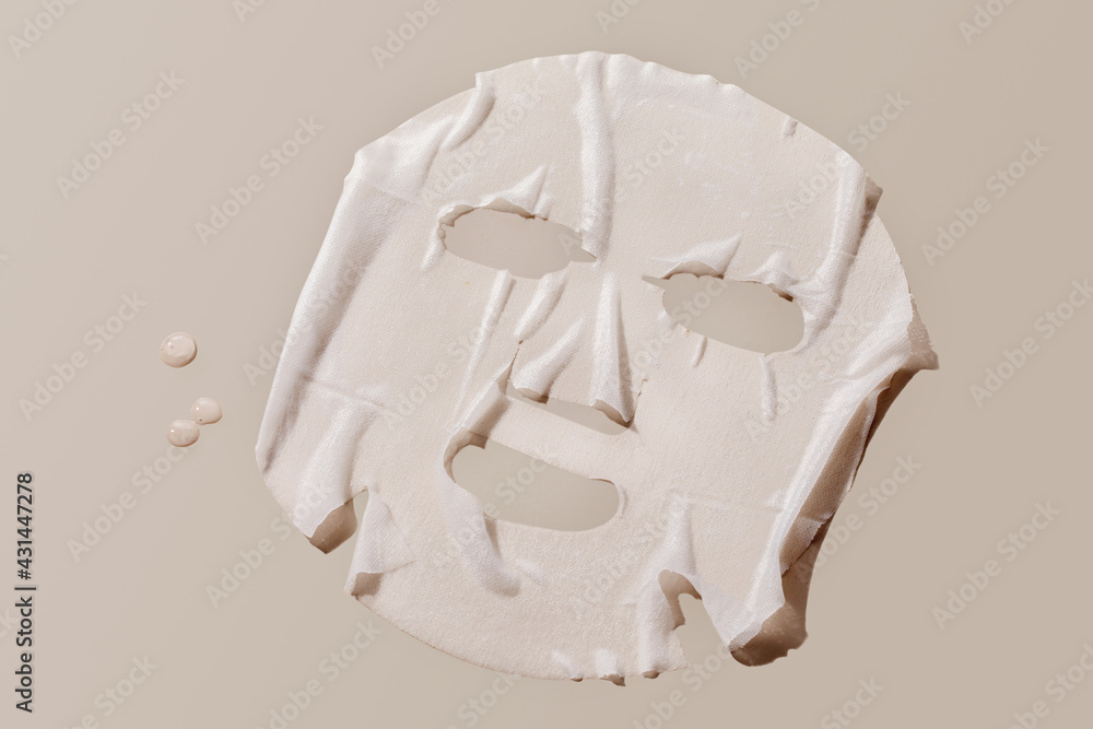 facial sheet mask on brown background. Stock Photo | Adobe Stock