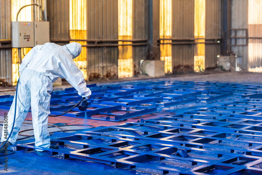 Airless Spray Painting, Worker painting on steel structure fabricated ...