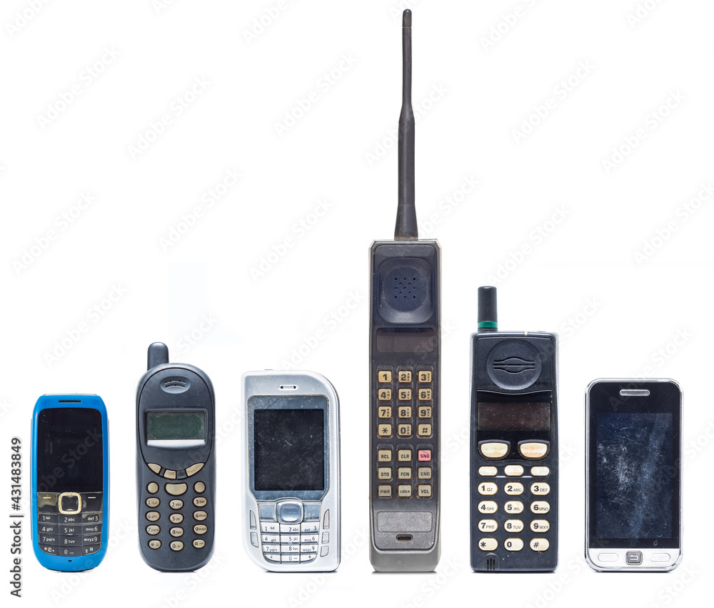 Group of old and obsolete mobile phone or cell phone on white ...