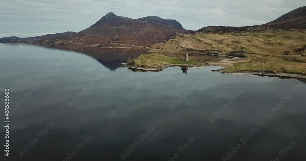 4k aerial footage of ruins of Ardvreck Castle and Loch Assynt with ...