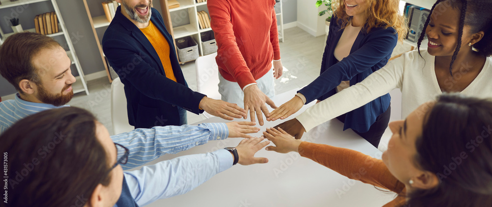 Foto Stock Banner with group of positive multiracial teammates ...
