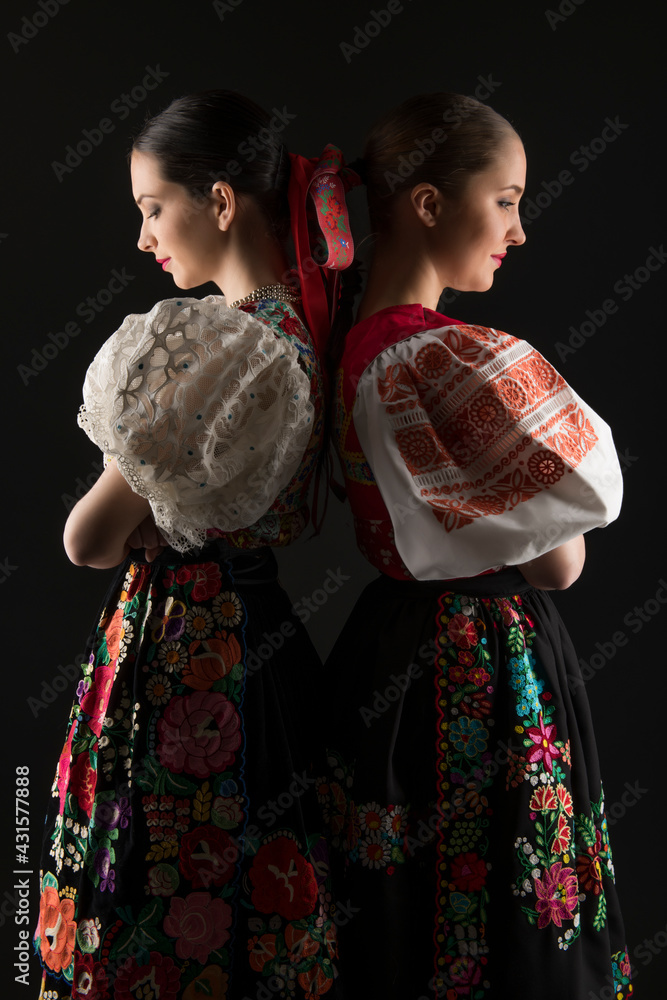 Young beautiful slovak women in traditional dress. Slovak folklore ...