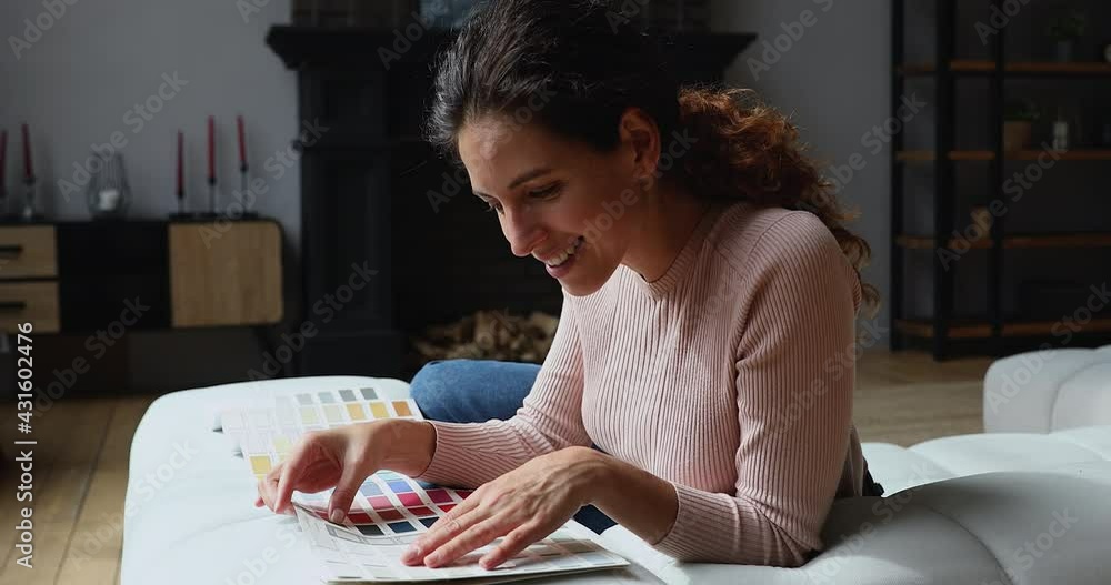 Female fashion designer learns pantone samples choose color shades ...