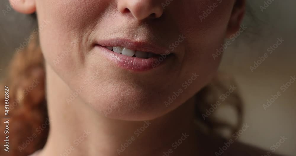 Video Stock Extreme close up view of lower face part of talking female ...