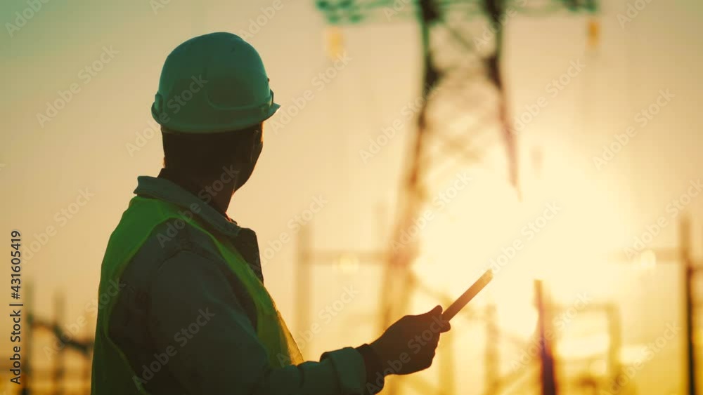 Electricity Work Concept. Silhouette Of Engineer In Helmet Standing On ...