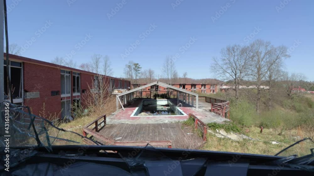 Static Shot through a Broken Window of an Abandoned Covered Pool ...