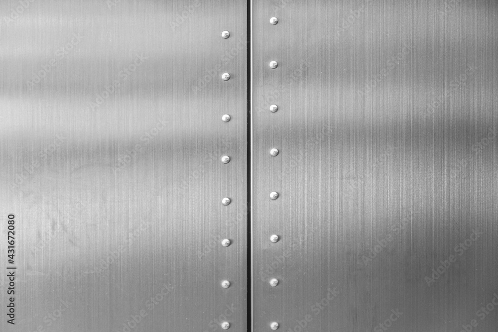 Metal wall with installed rivets. For uniting two plates or pieces of ...