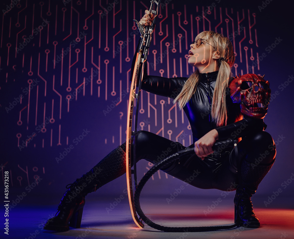 Female fighter in cyberpunk style with glowing sword Stock Photo ...
