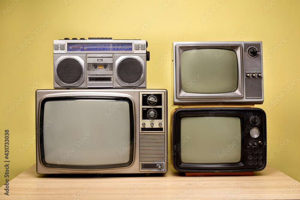 Retro old television blank screen with old portable radio cassette ...