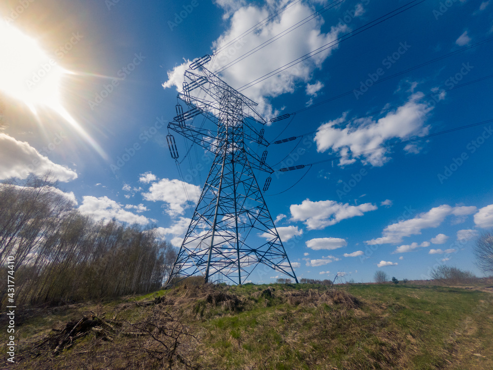 High-voltage power lines with insulators, stabilizers and transformers ...