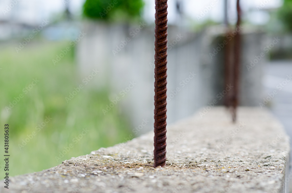 with rod in the wall, to reinforce the concrete are made of mild steel ...