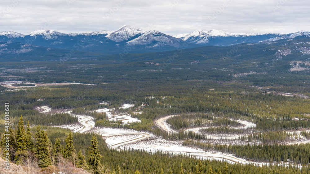 Above, aerial view of the winding Yukon River outside of Whitehorse in ...