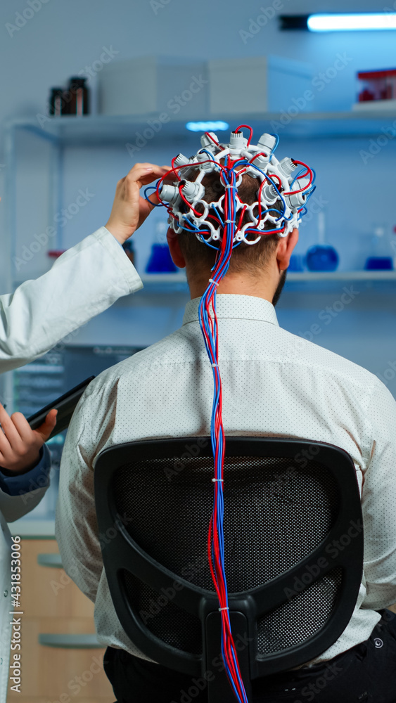 Man patient wearing performant eeg headset scanning brain electrical ...