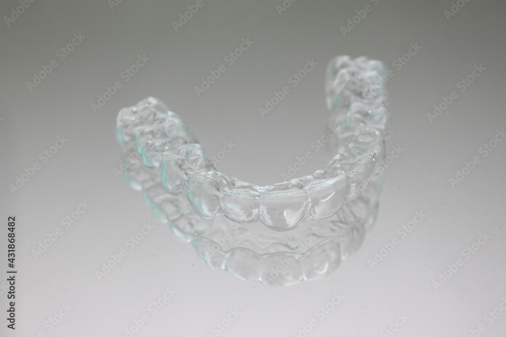 Align your teeth with clear aligner. Clear retainer Stock Photo | Adobe ...