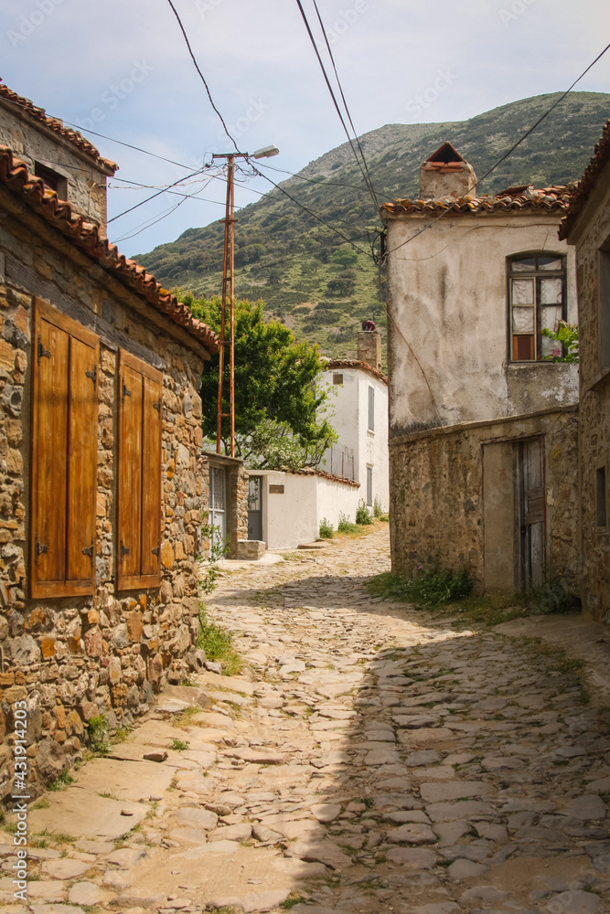 Beautiful old street paved with stones, turkish traditional village ...