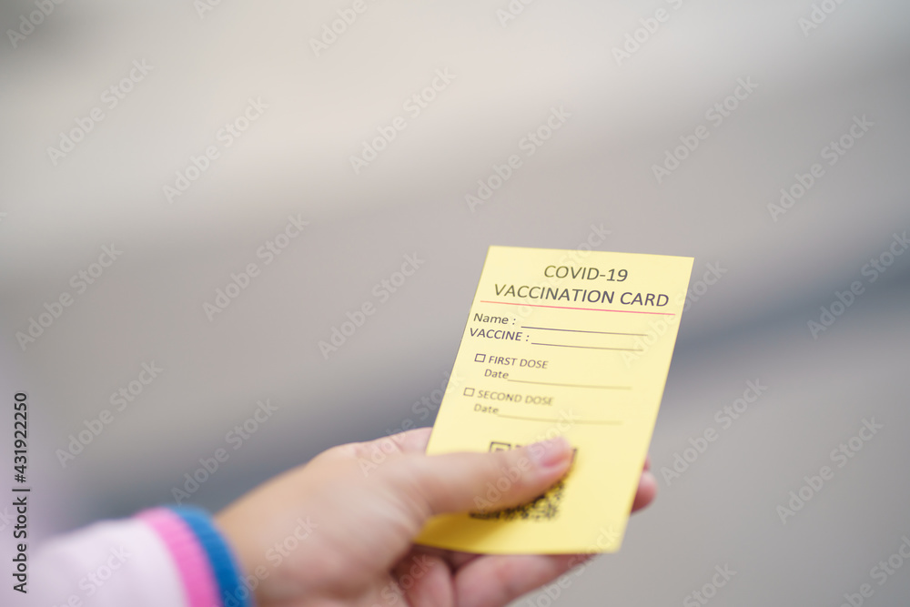 Passport with vaccination certificate for COVID-19 person record card ...