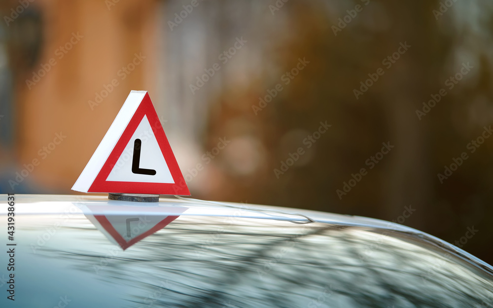 Foto de Learner driver school. Car with driving school sign, L learner ...